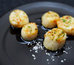 Roast scallops with Parmesan | Tesco Real Food