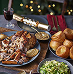 Spiced mulled pulled pork with Yorkshire puddings and shredded sprouts ...