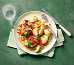 Satay chicken with spring onion roasties | Tesco Real Food