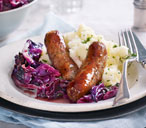 Herby sausages with red cabbage | Tesco Real Food