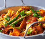 Spiced vegetable balti with garlic naan | Tesco Real Food